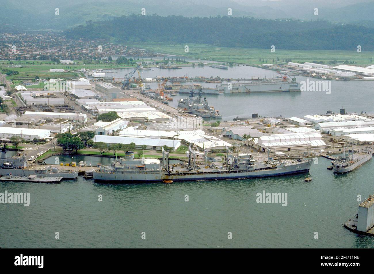 A starboard view of the oiler USNS HASSAYAMPA (T-AO-145) docked at the ...