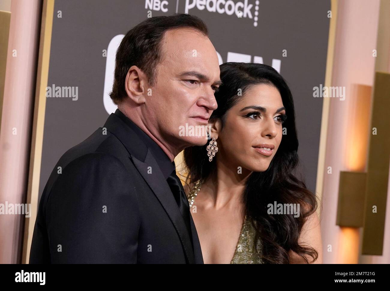 Quentin Tarantino, left, and Daniella Pick arrive at the 80th annual Golden Globe Awards at the ...