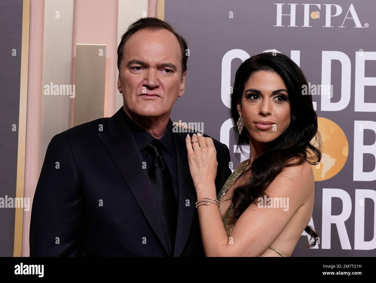 Quentin Tarantino, left, and Daniella Pick arrive at the 80th annual ...