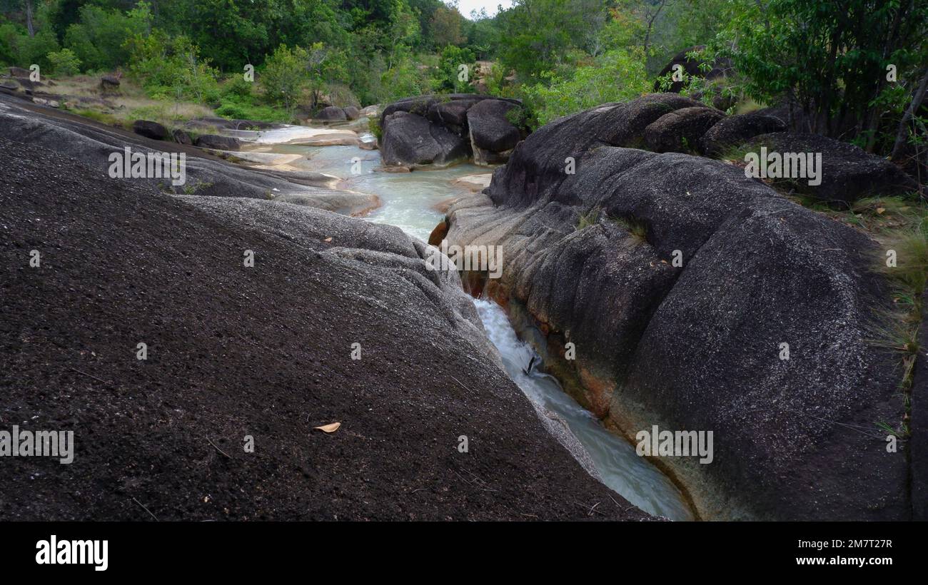 Natural Landscape With Black Rock Formations, Which Are Fed By A ...