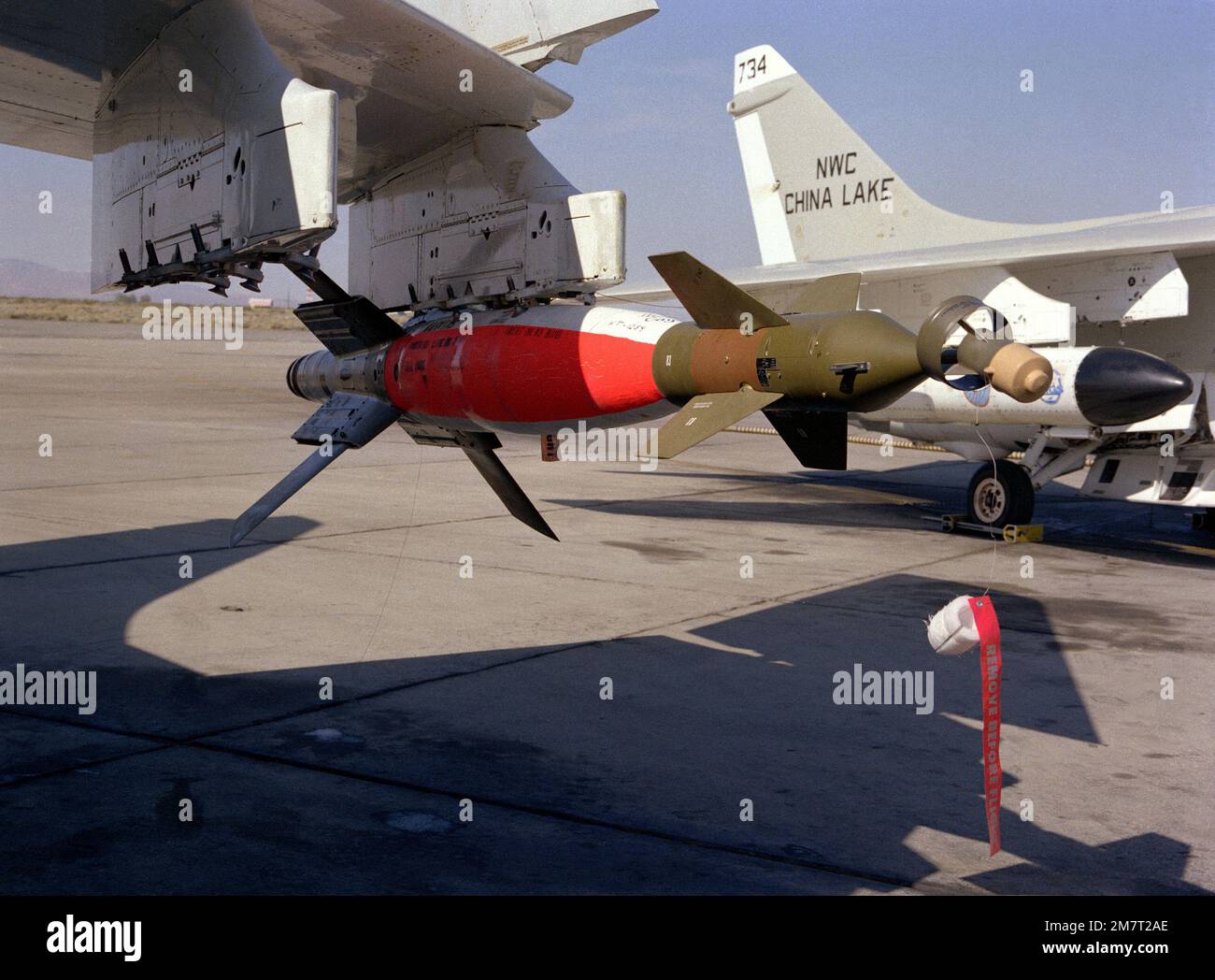 A close-up view of a Skipper II laser guided bomb mounted on the wing ...