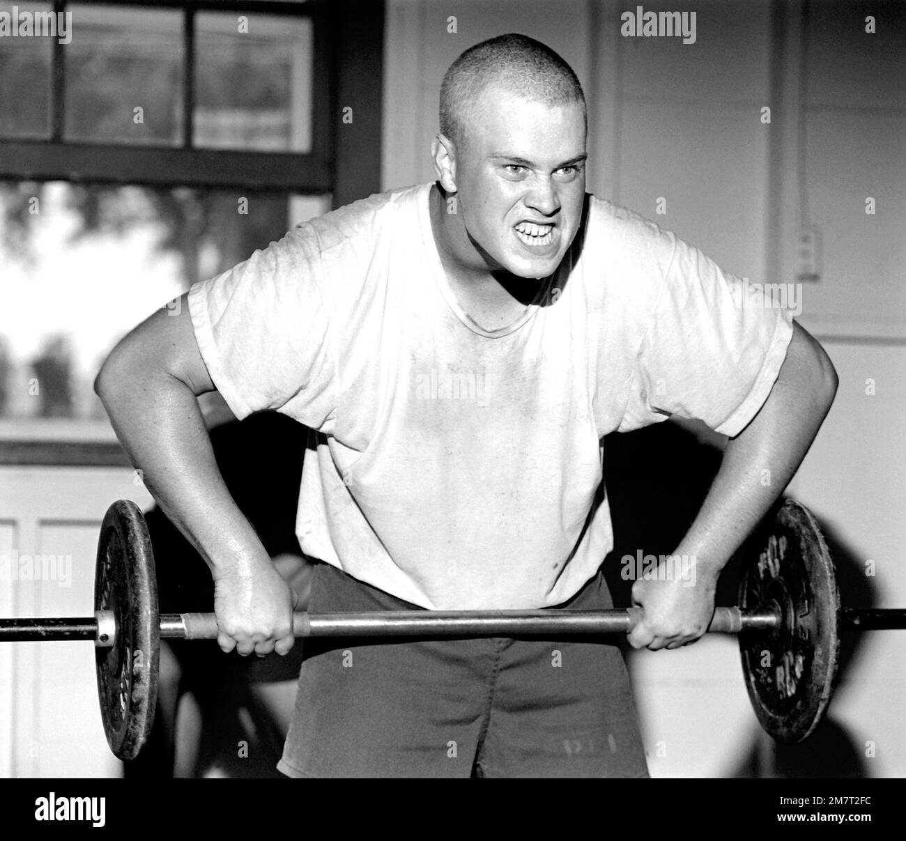 A recruit from the physical conditioning platoon does weight lifting ...