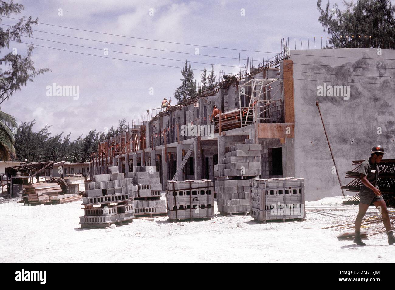 Seabees work at a building construction site. Base: Nav Sup Activity ...