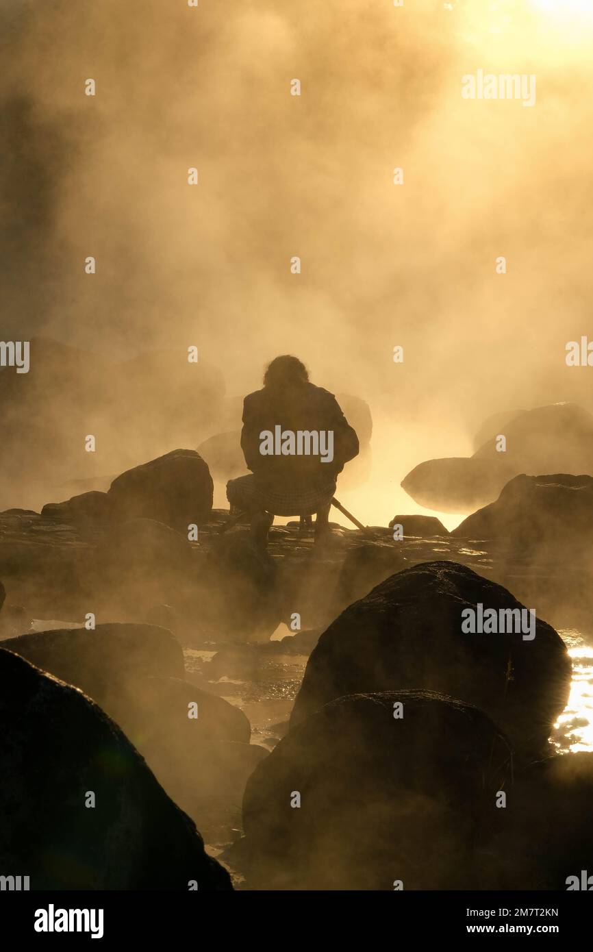 January 8, 2023; Hot springs and fog in Thailand with morning sunlight ...