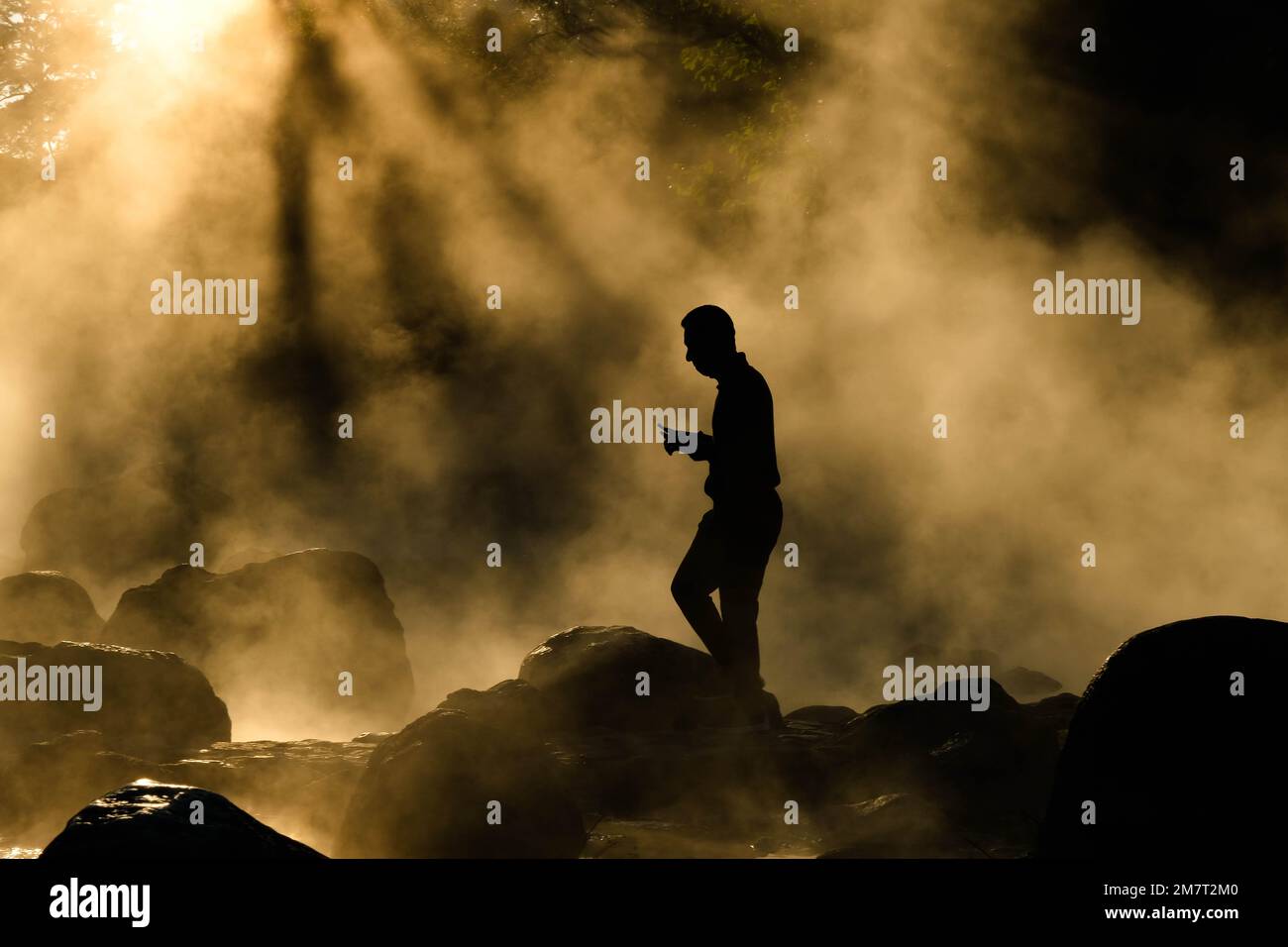 January 8, 2023; Hot springs and fog in Thailand with morning sunlight ...