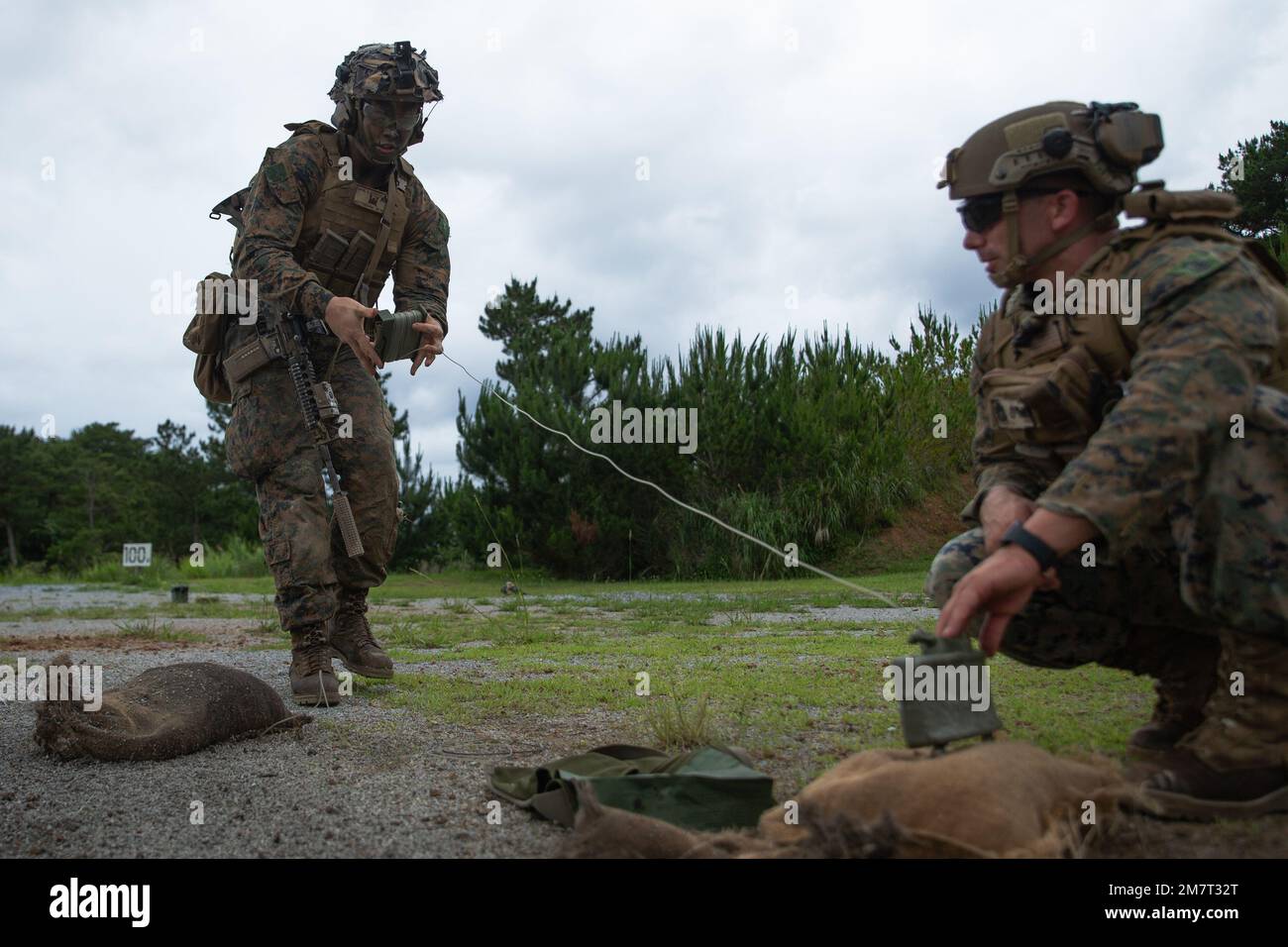 U.S. Marines with 3d Battalion, 2nd Marines, set up a M18 Claymore mine ...