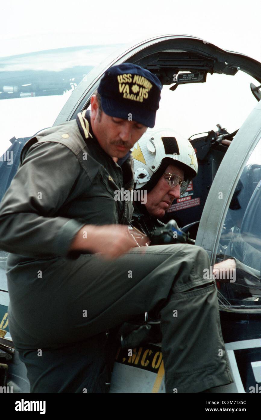 Admiral Thomas B. Hayward, CHIEF of Naval Operations, talks to a flight ...