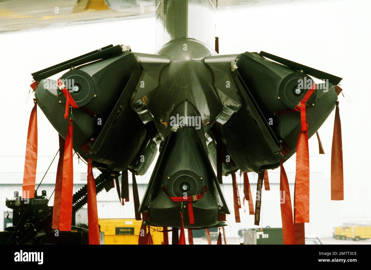 A rear view of three Air-Launched Cruise Missiles mounted to the pylon ...