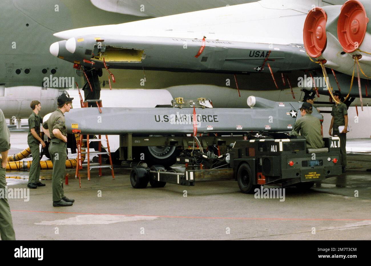 The missile crew from the 416th Bomb Wing, position an Air-Launched ...
