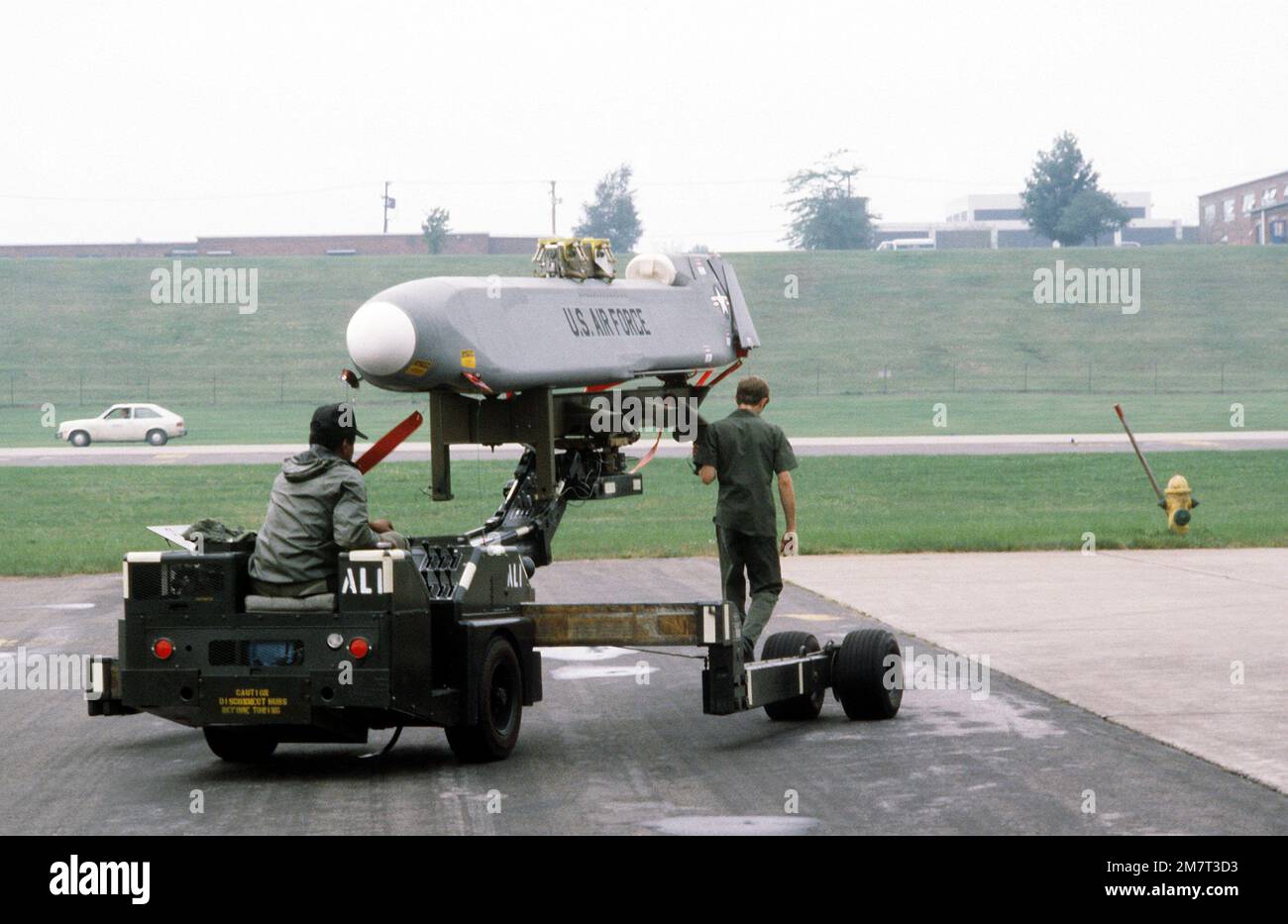 The missile crew from the 416th Bomb Wing, transports an Air-Launched ...