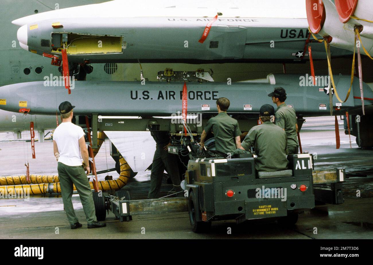 The missile crew from the 416th Bomb Wing, position an Air-Launched ...