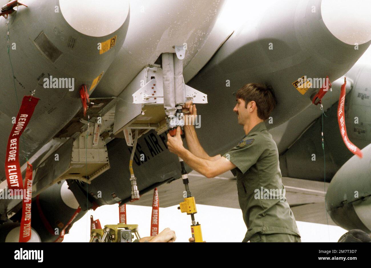 A missile crewman from the 416th Bomb Wing, tests the power cord after ...