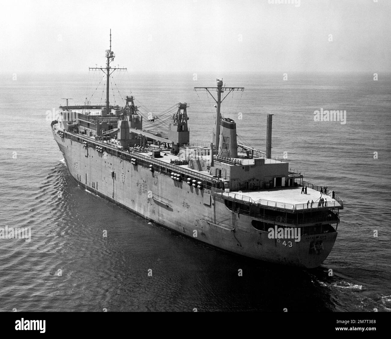 Aerial port quarter view of the destroyer tender USS CAPE COD (AD 43 ...