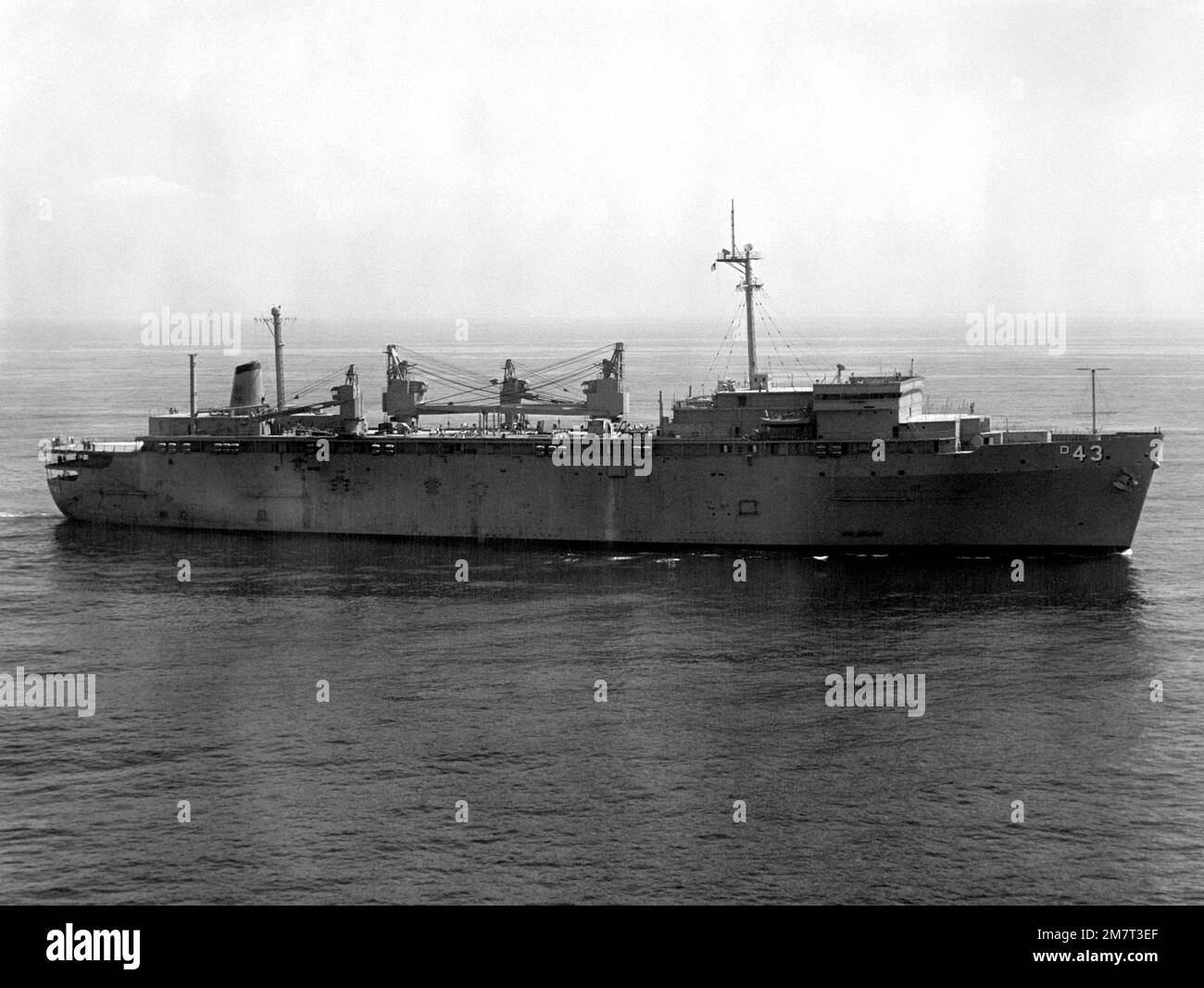 A starboard beam view of the destroyer tender USS CAPE COD (AD-43 ...