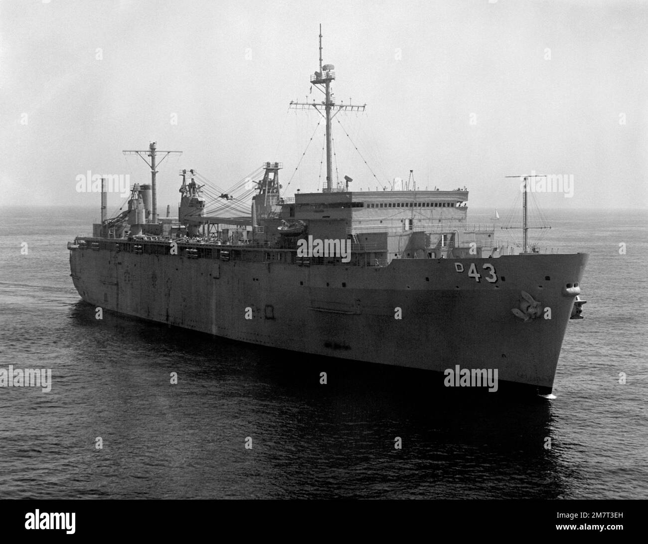 A starboard bow view of the destroyer tender USS CAPE COD (AD-43 ...