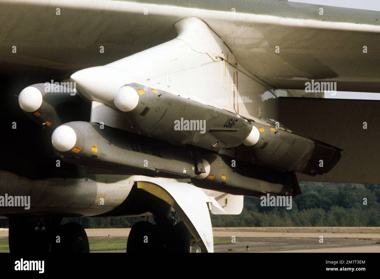 A left front view of three Air-Launched Cruise Missiles mounted to the ...