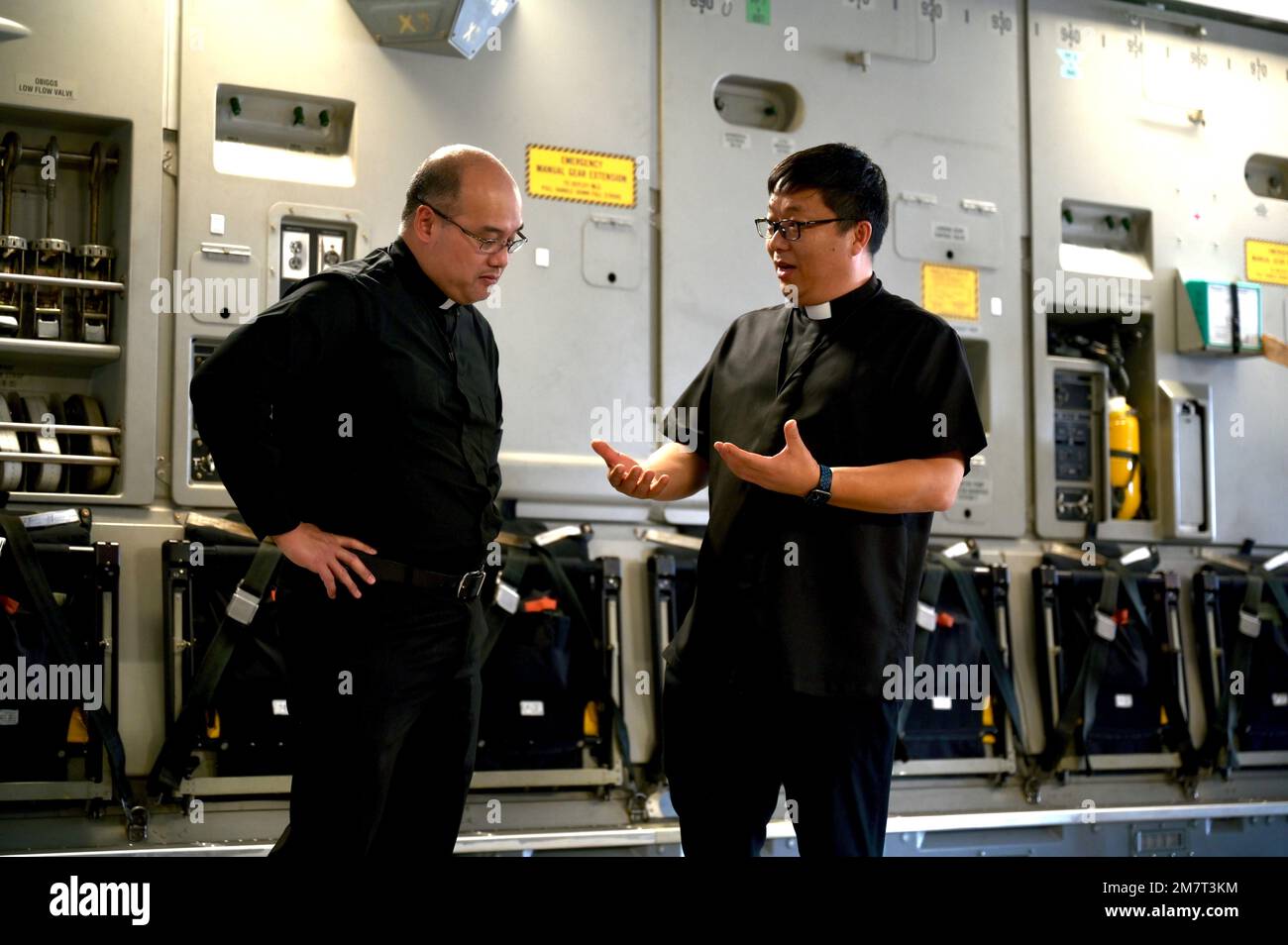 Father Rheo Ofalsa, Holy Family Catholic Church pastor, talks with ...