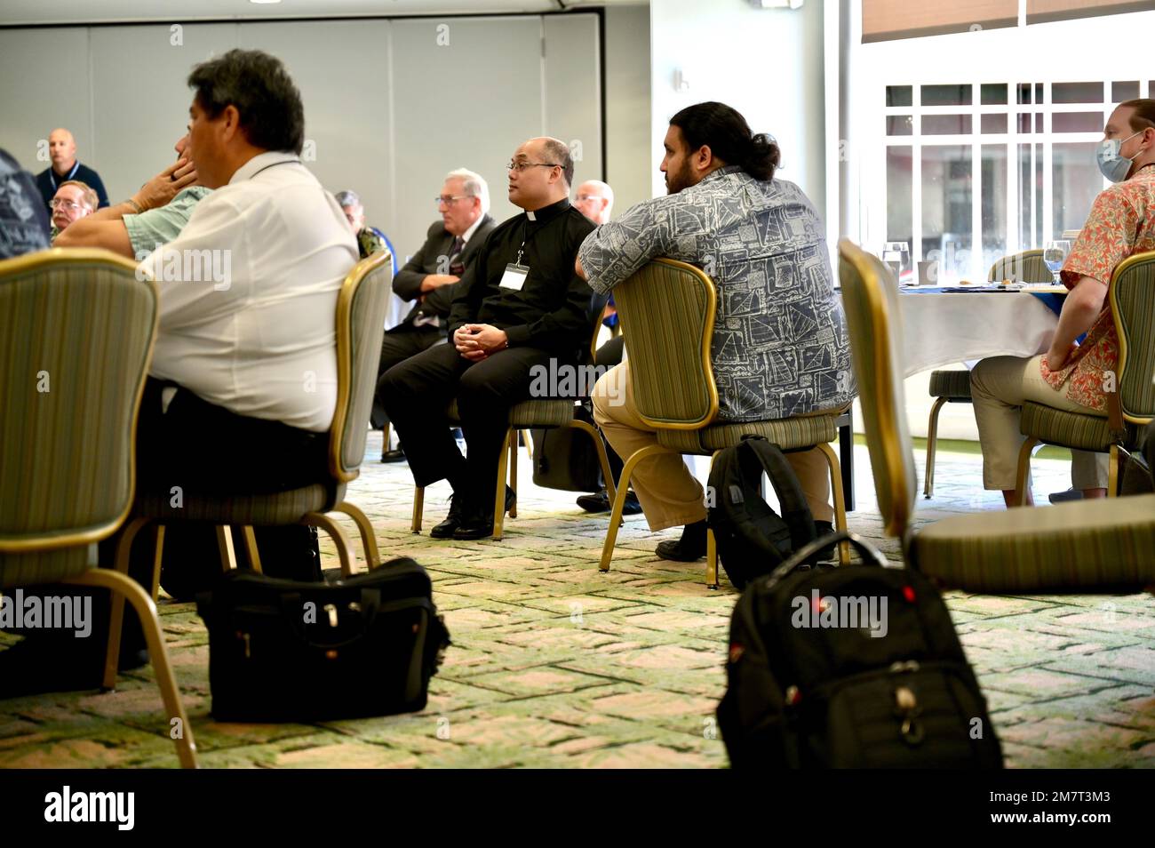 Attendees of a Cultural Religious Leader Engagement event listen to a ...