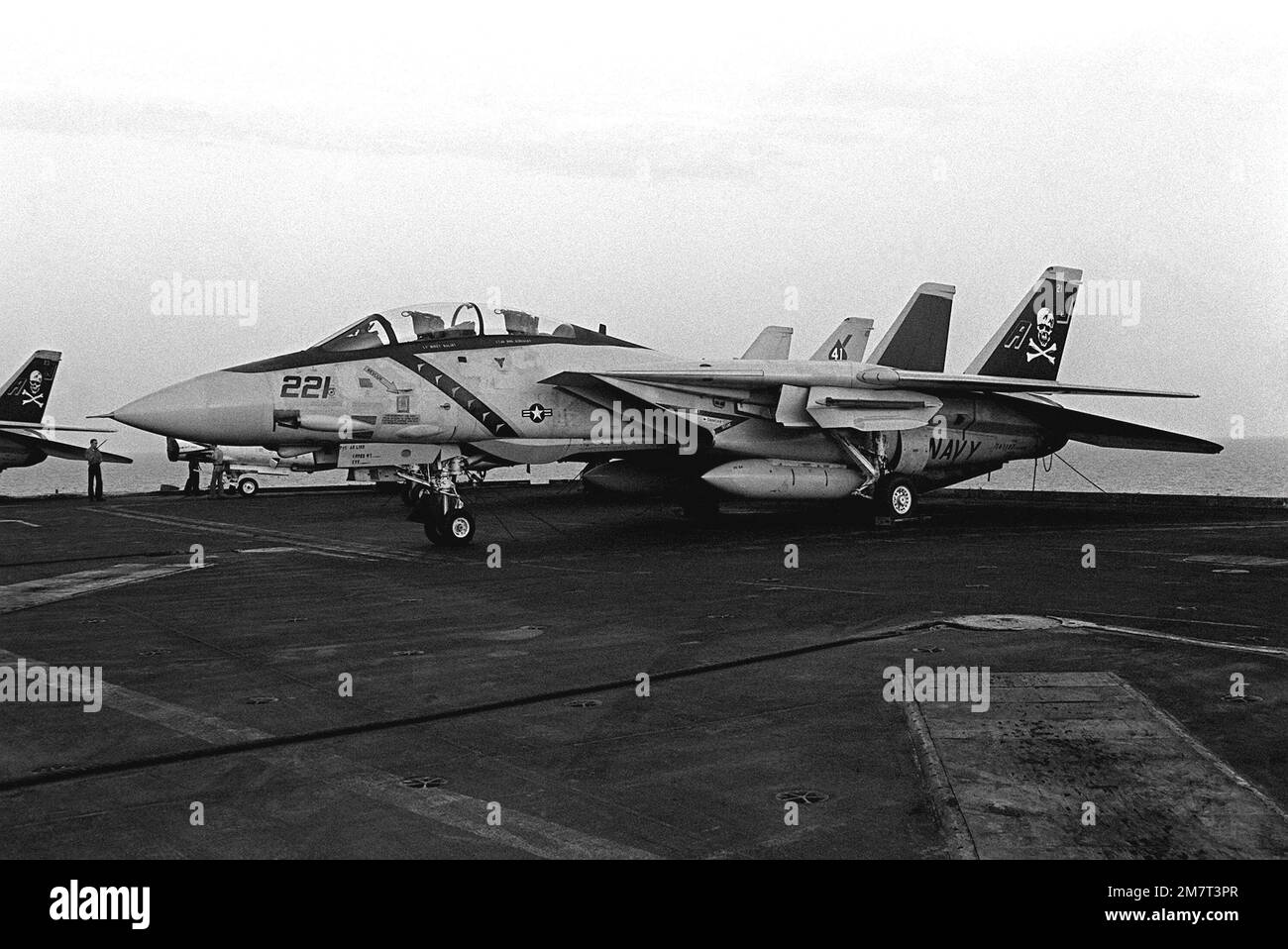 A left side view of a parked F-16 Tomcat aircraft aboard the nuclear ...