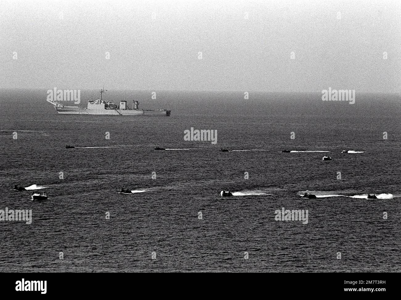 U.S. Marines from the 34th Marine Amphibious Unit form assault waves as ...