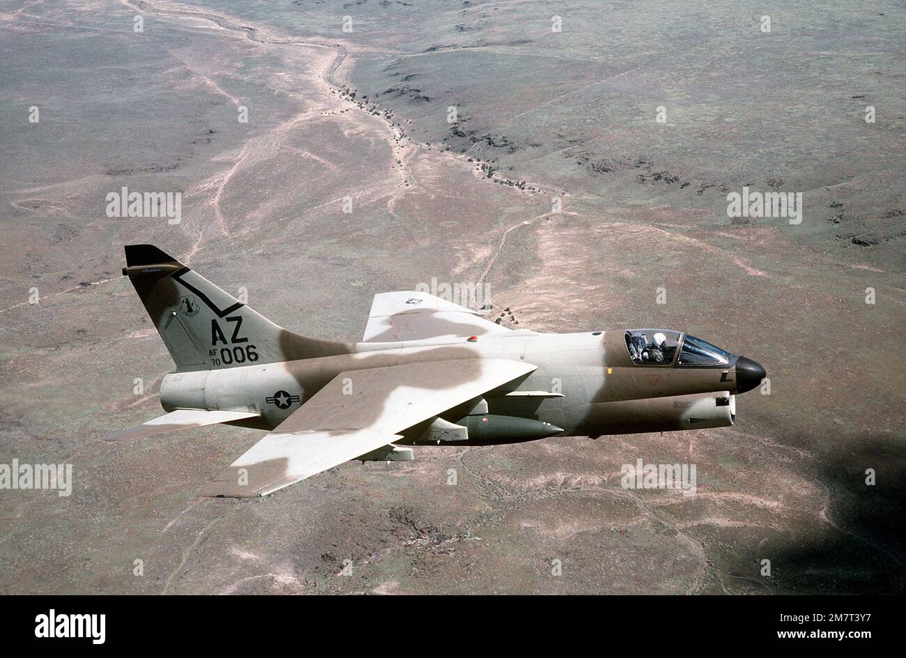 AN air-to-air right side view of an A-7D Corsair II aircraft, from the ...