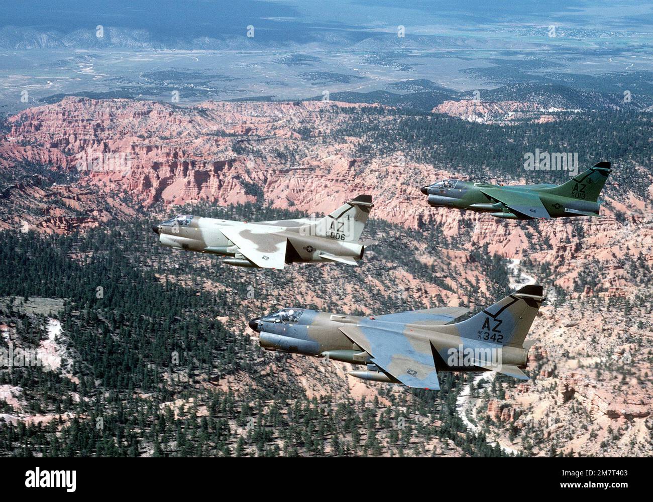 AN air-to-air left side view of three A-7D Corsair II aircraft from ...