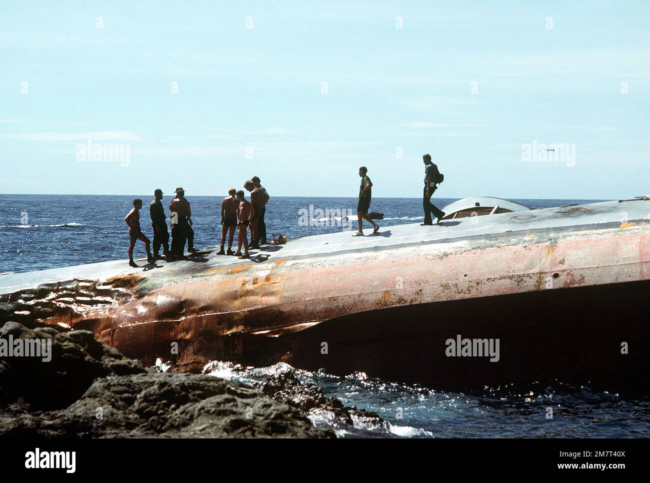 A U.S. Navy explosive ordnance team, Detachment 21, attempts to gain ...