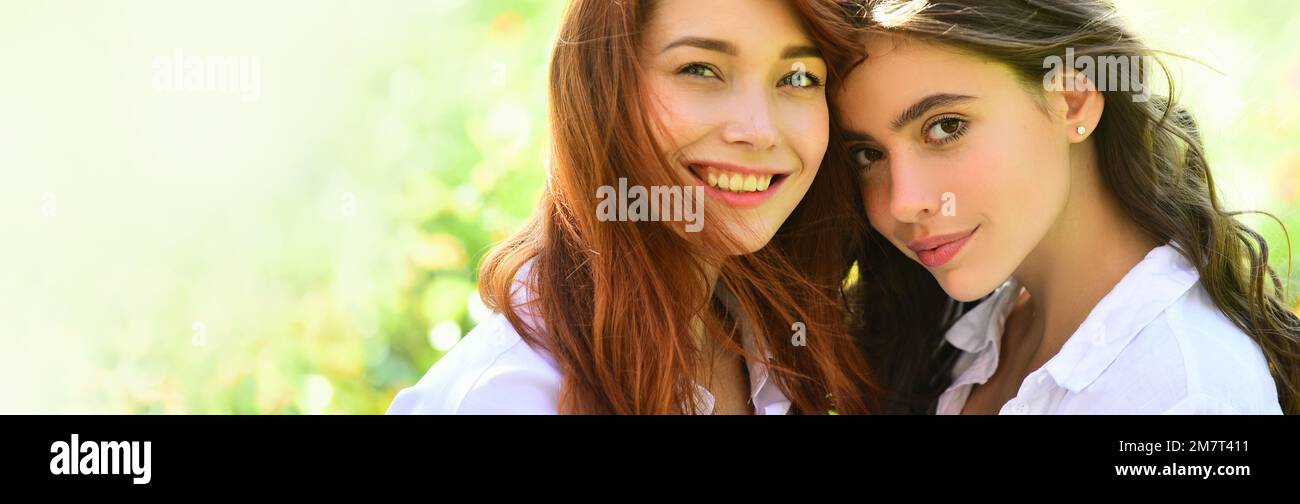 Sensual woman spring outdoor portrait banner. Sisters having fun ...