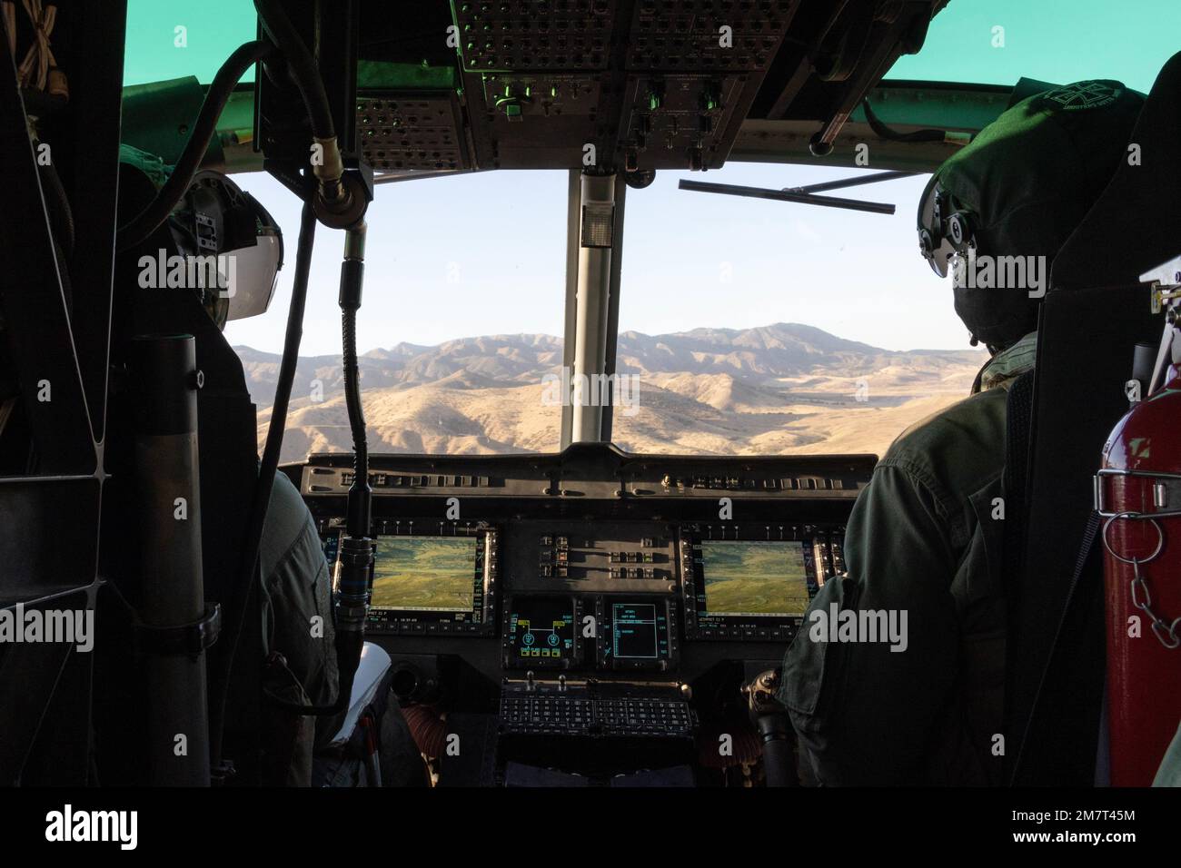 U.S. Marine pilots with Marine Light Attack Helicopter Squadron 775 ...