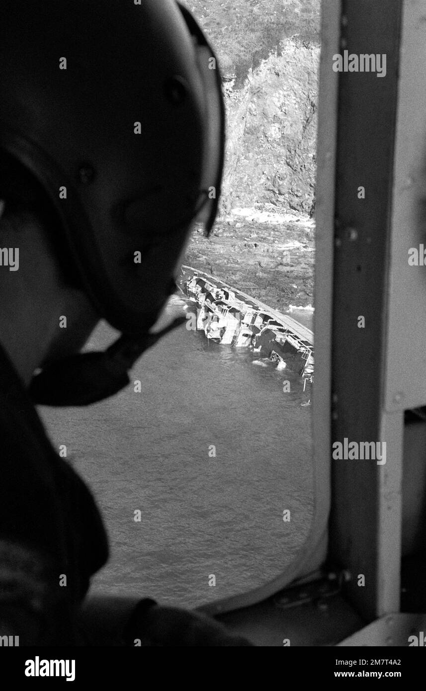 Aerial port view of the capsized Philippine destroyer escort ship DATU ...