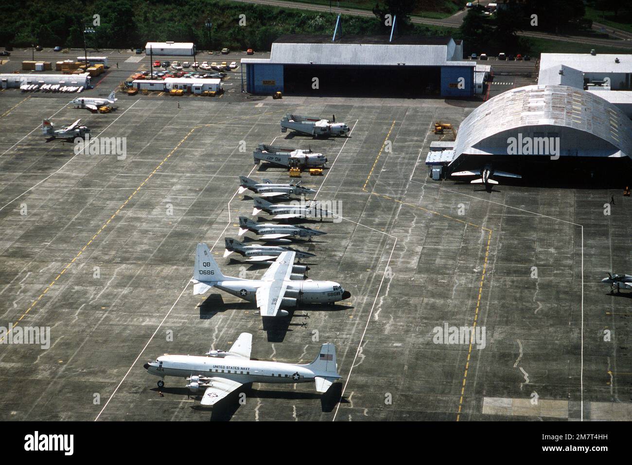 An aerial view of aircraft parked on the flight line. The aircraft are ...