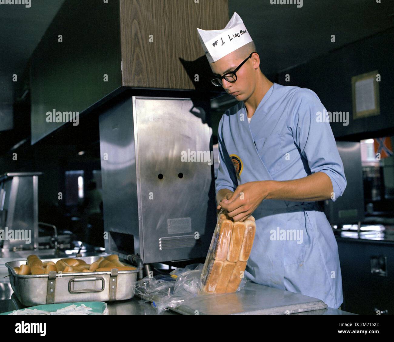 A recruit from the 3rd Battalion, number one lineman in the mess hall ...