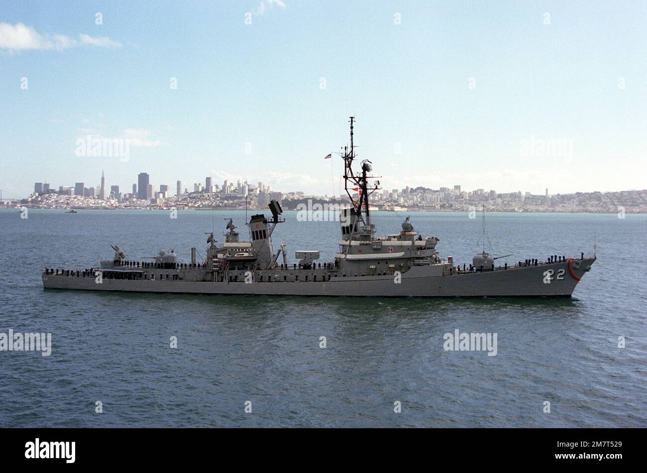 A starboard beam view of the guided missile destroyer USS BENJAMIN ...