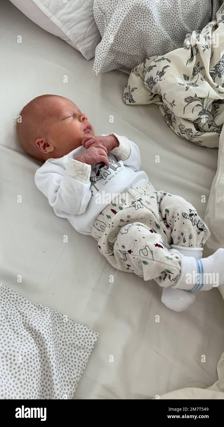 Sleeping new born hi-res stock photography and images - Alamy