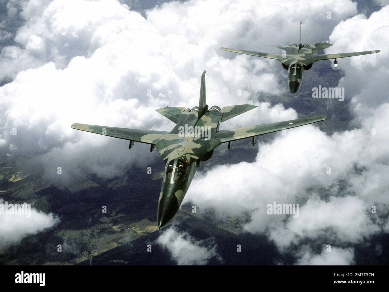 Front view of two Royal Australian Air Force F-111 aircraft in flight ...