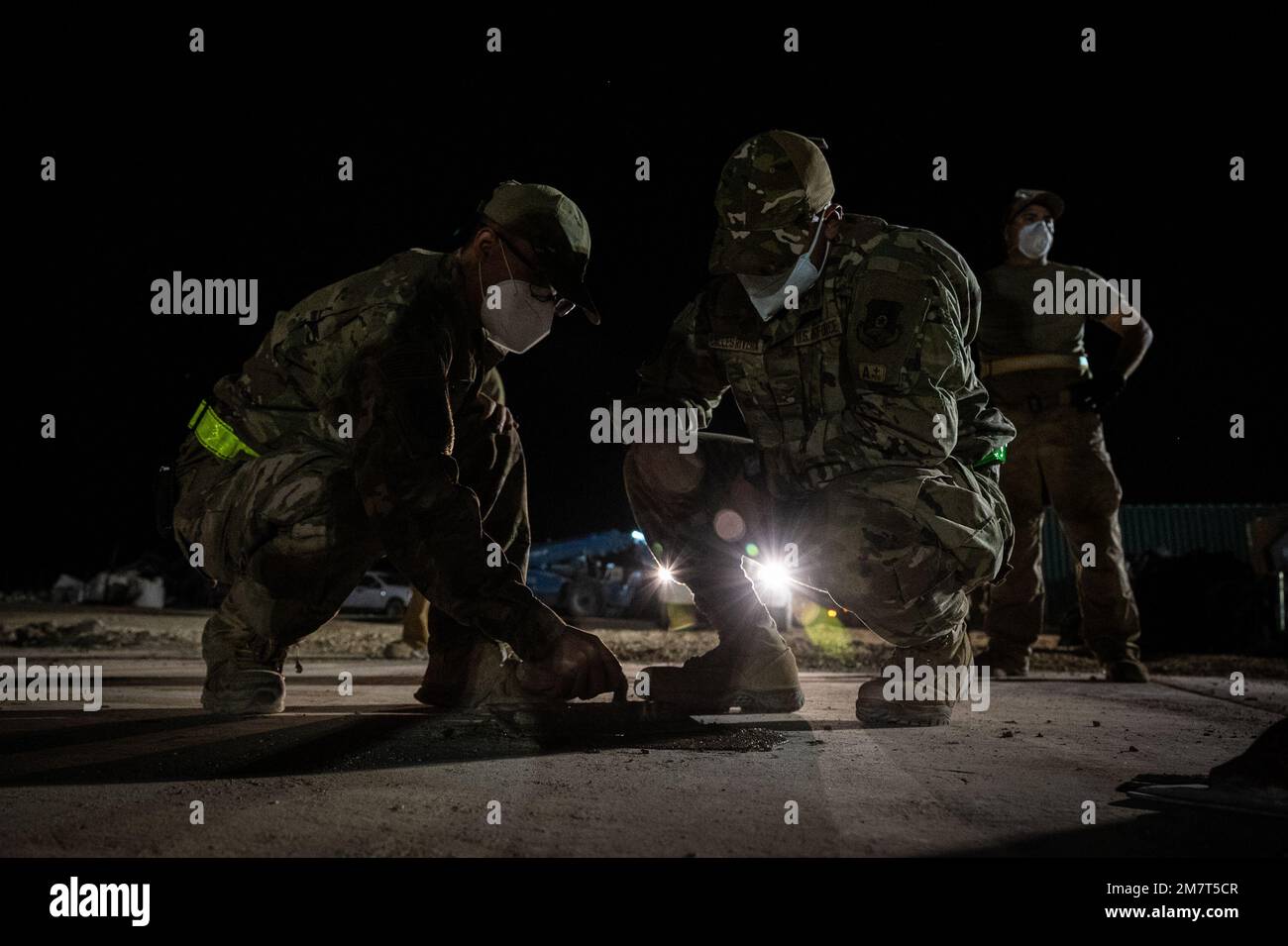 332d Expeditionary Civil Engineer Squadron Airmen expedite the repair ...