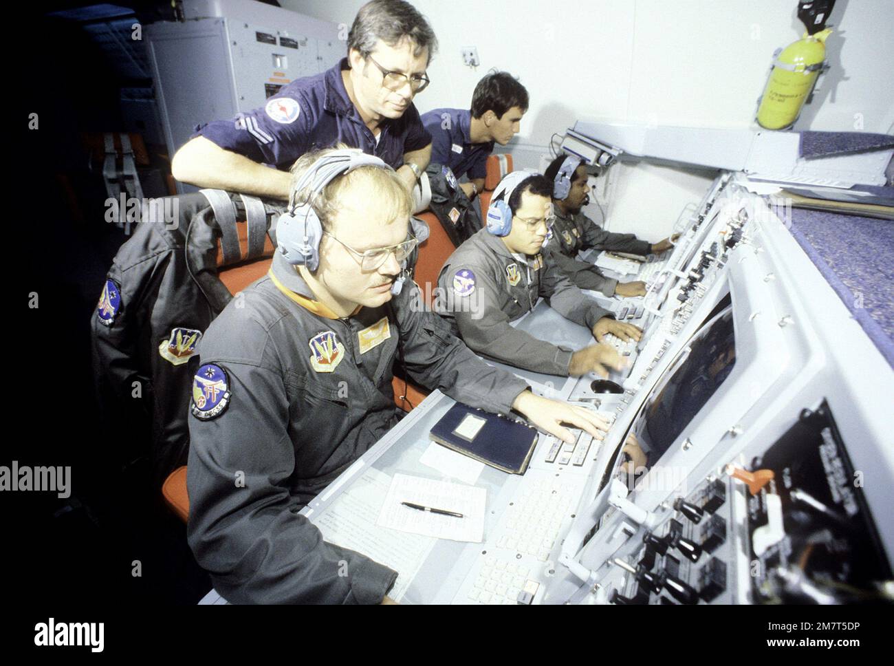 Royal Australian Air Force personnel observe flight operations aboard ...