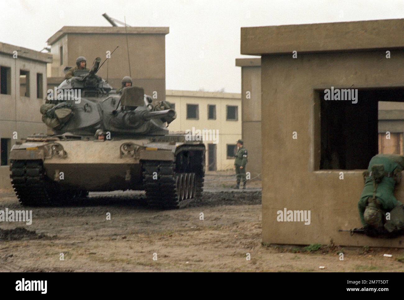 An M-60 Main Battle tank from the 1ST Armored Cavalry moves through a ...