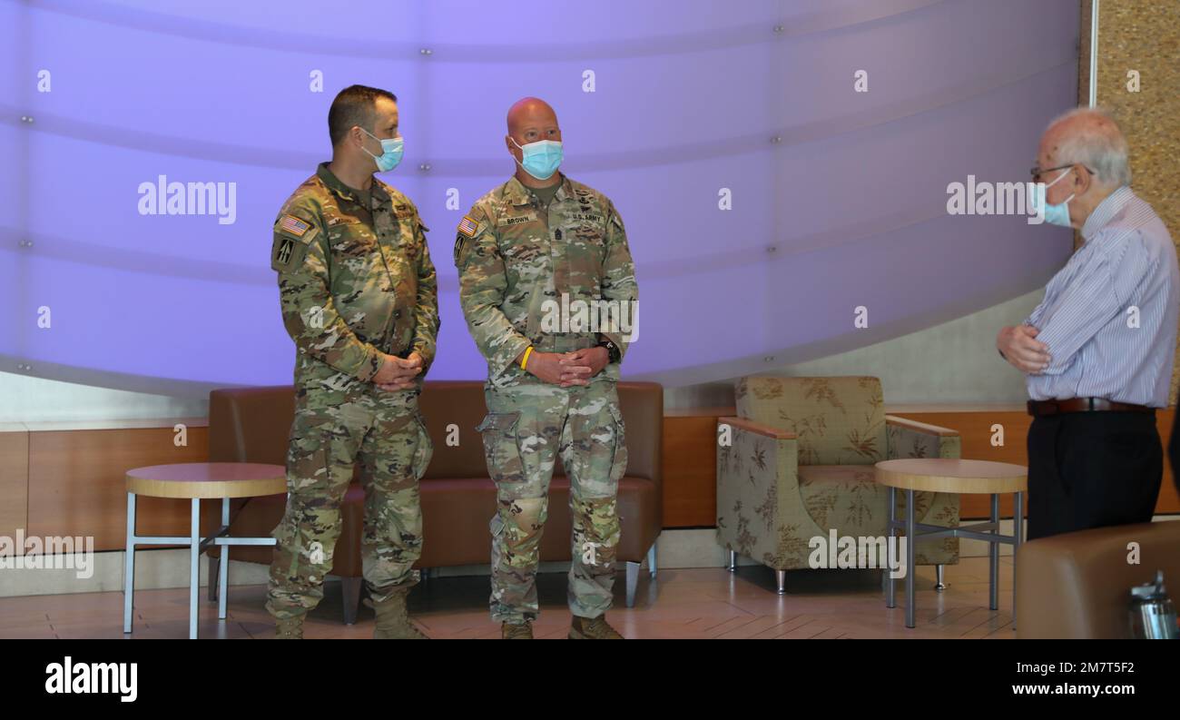 Brig. Gen. Justin L. Mann, director of joint staff, stands with Command ...