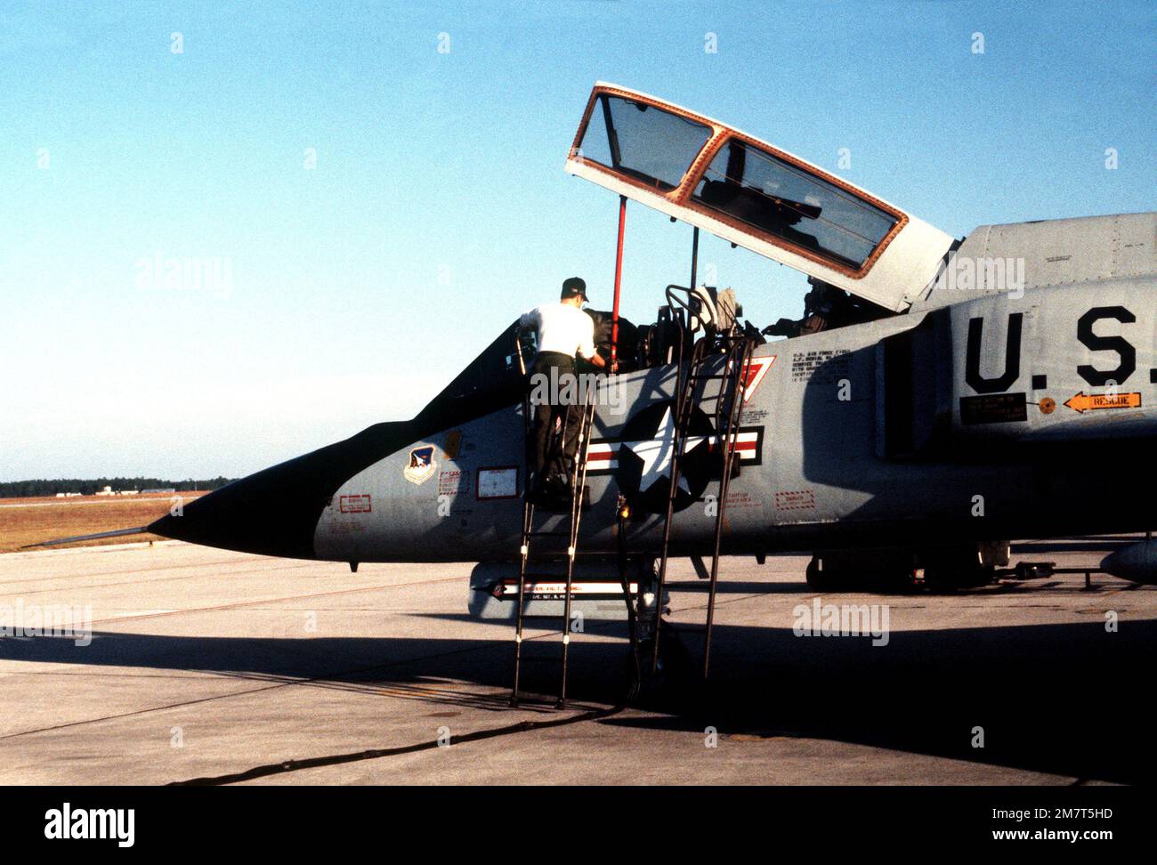 AIRMAN 1ST Class Paul Pepard and AIRMAN Kevin Curran work on an F-106 ...
