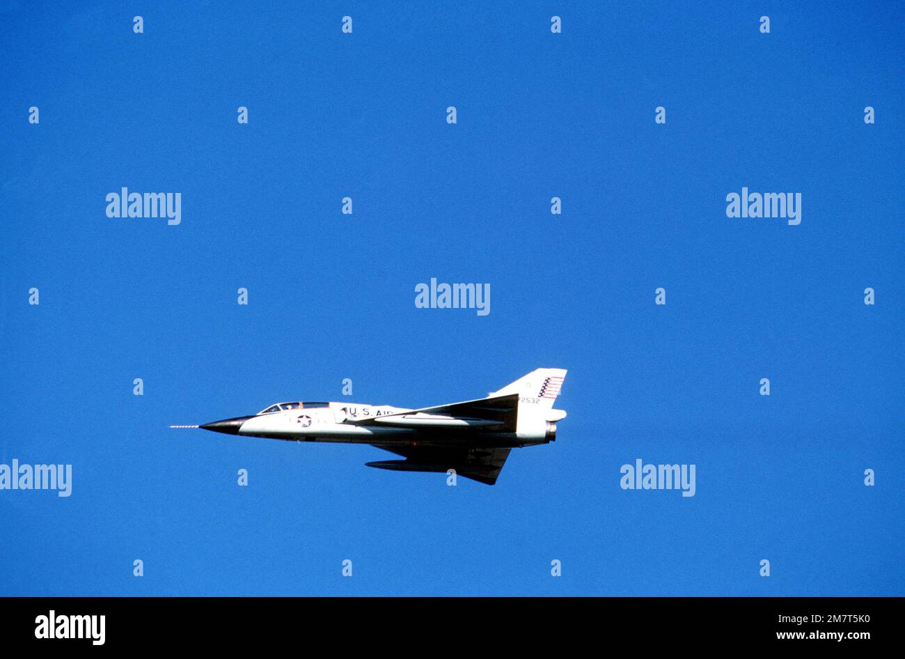 An F-106 Delta Dart in flight, immediately after takeoff during ...