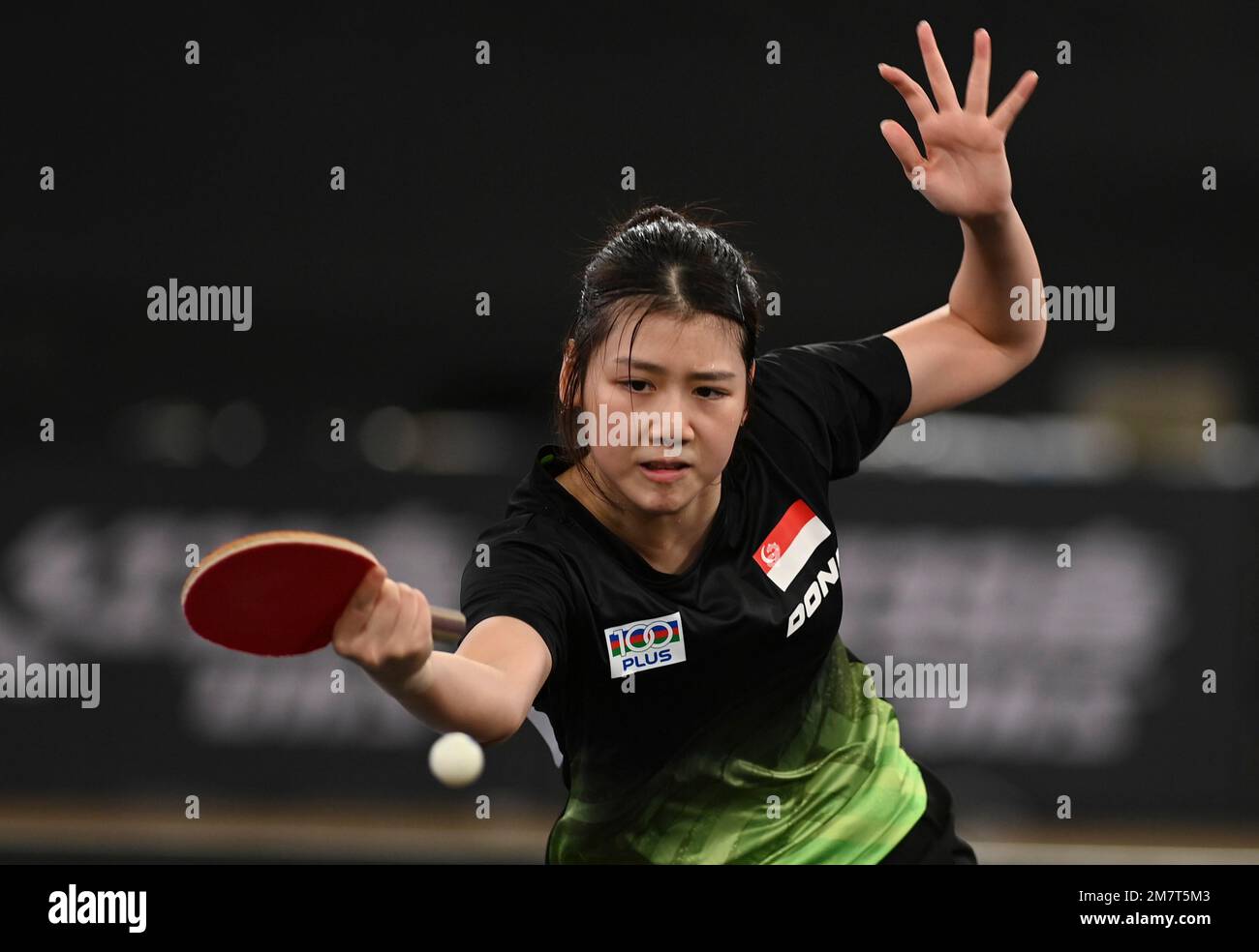 Doha, Qatar. 10th Jan, 2023. Wong Xin Ru of Singapore hits a return ...