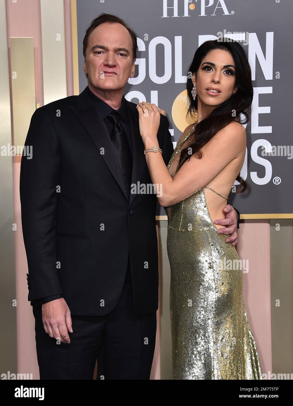 Quentin Tarantino, left, and Daniella Pick arrive at the 80th annual Golden Globe Awards at the ...