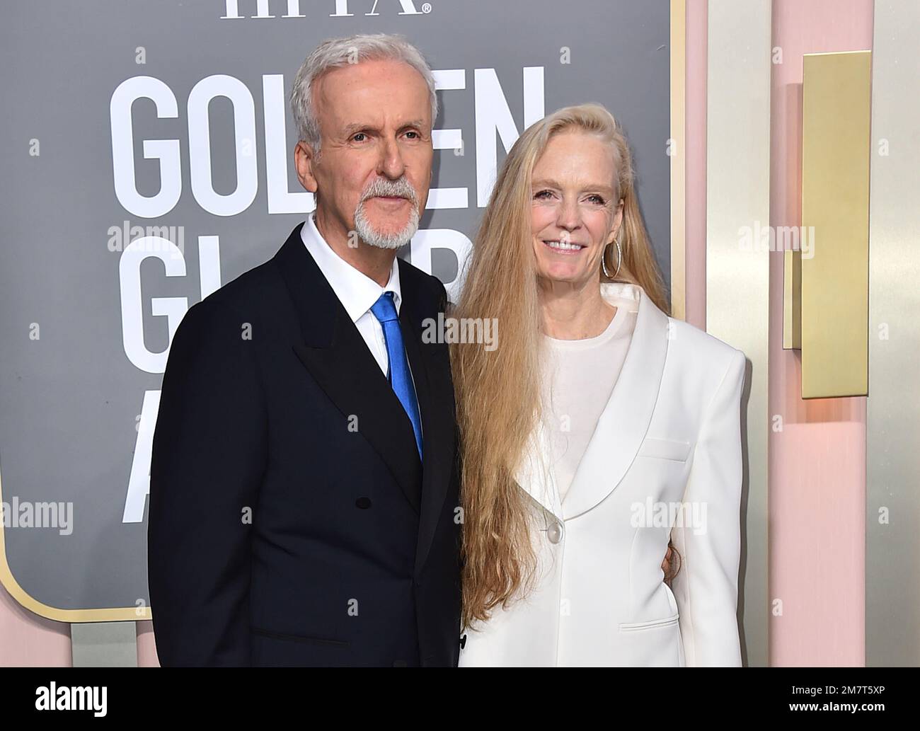 James Cameron, left, and Suzy Amis Cameron arrive at the 80th annual ...