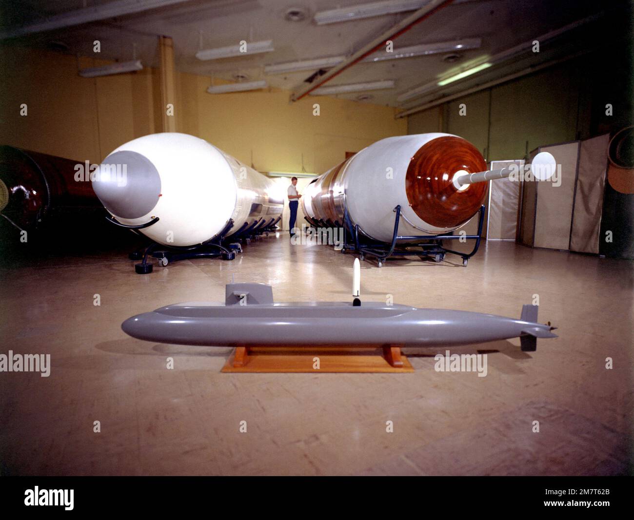 A view of a mock-up of a Trident I C-4 missile, right, and its ...