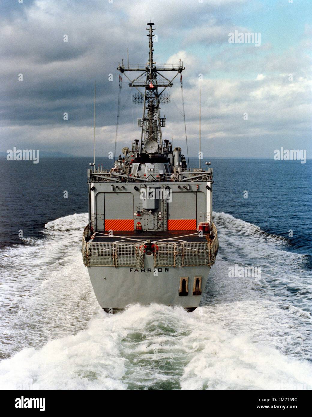 An aerial stern view of the guided missile frigate FAHRION (FFG-22) as ...