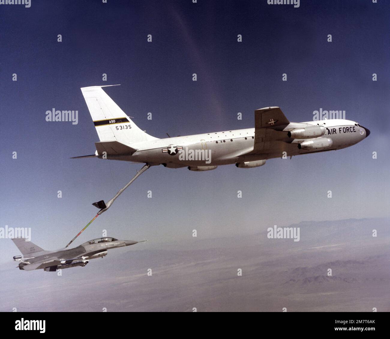 An air-to-air right side view of a KC-135 Stratotanker aircraft ...