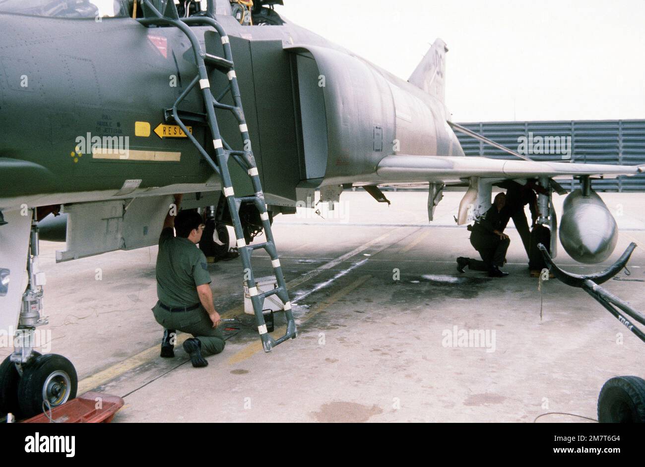 Maintenance crewmen from the Eighth Tactical Fighter Wing make a pre ...