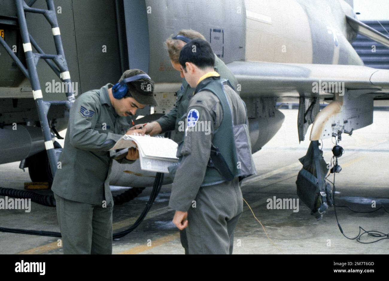 Maintenance crewmen from the 8th Tactical Fighter Wing make a pre ...