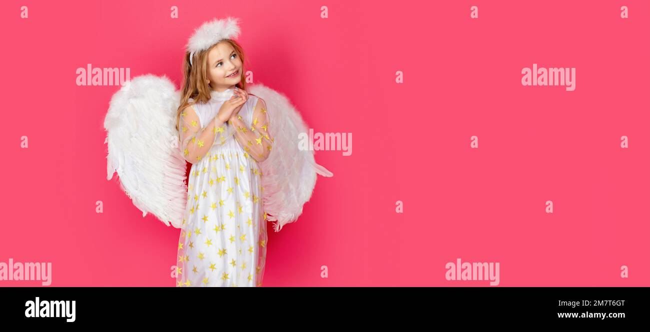 Angel child banner, isolated studio background. Beautiful little angel ...